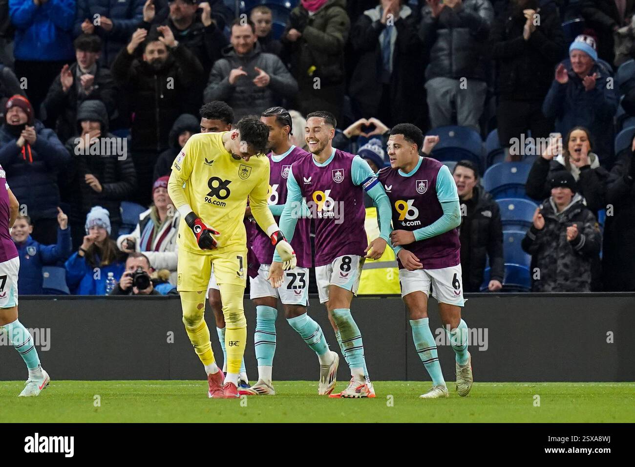 Burnley, UK. 21st Feb, 2025. Burnley goalkeeper James Trafford (1) and ...