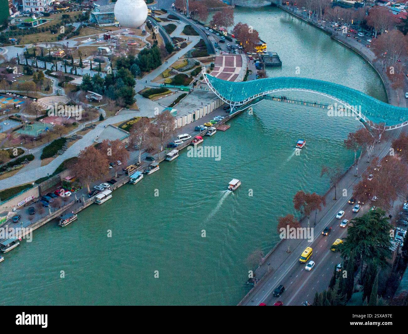 Drone point of view . WINTER in Tbilisi: Kura river flow and bridge of ...