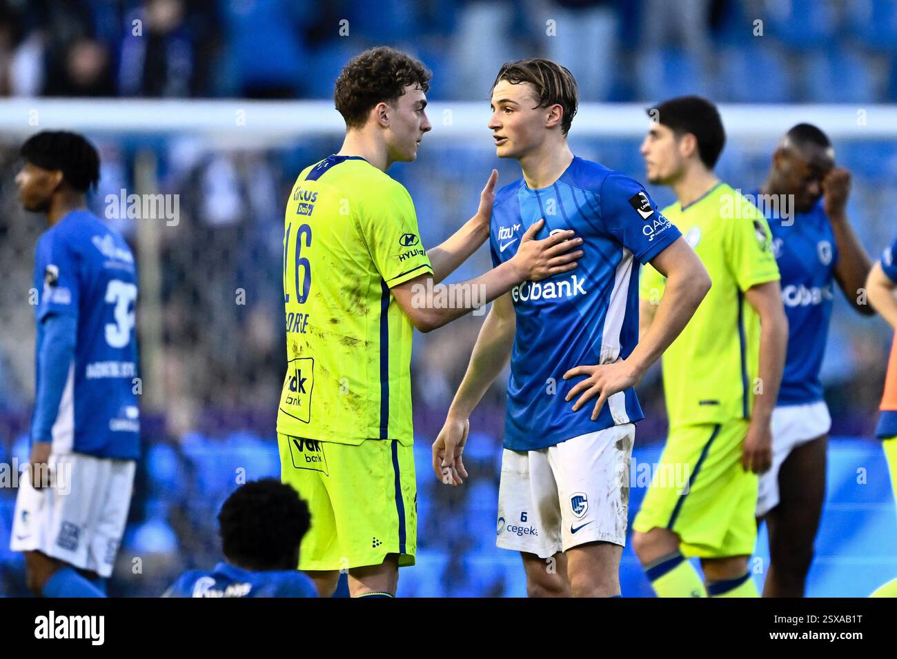 Gent's Mathias Delorge and Genk's Matte Smets pictured during a soccer ...