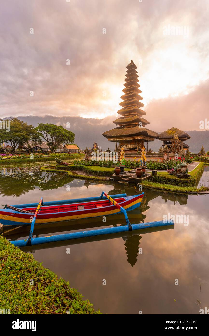 View of Ulun Danu Beratan temple on Lake Bratan at sunrise; Bali ...