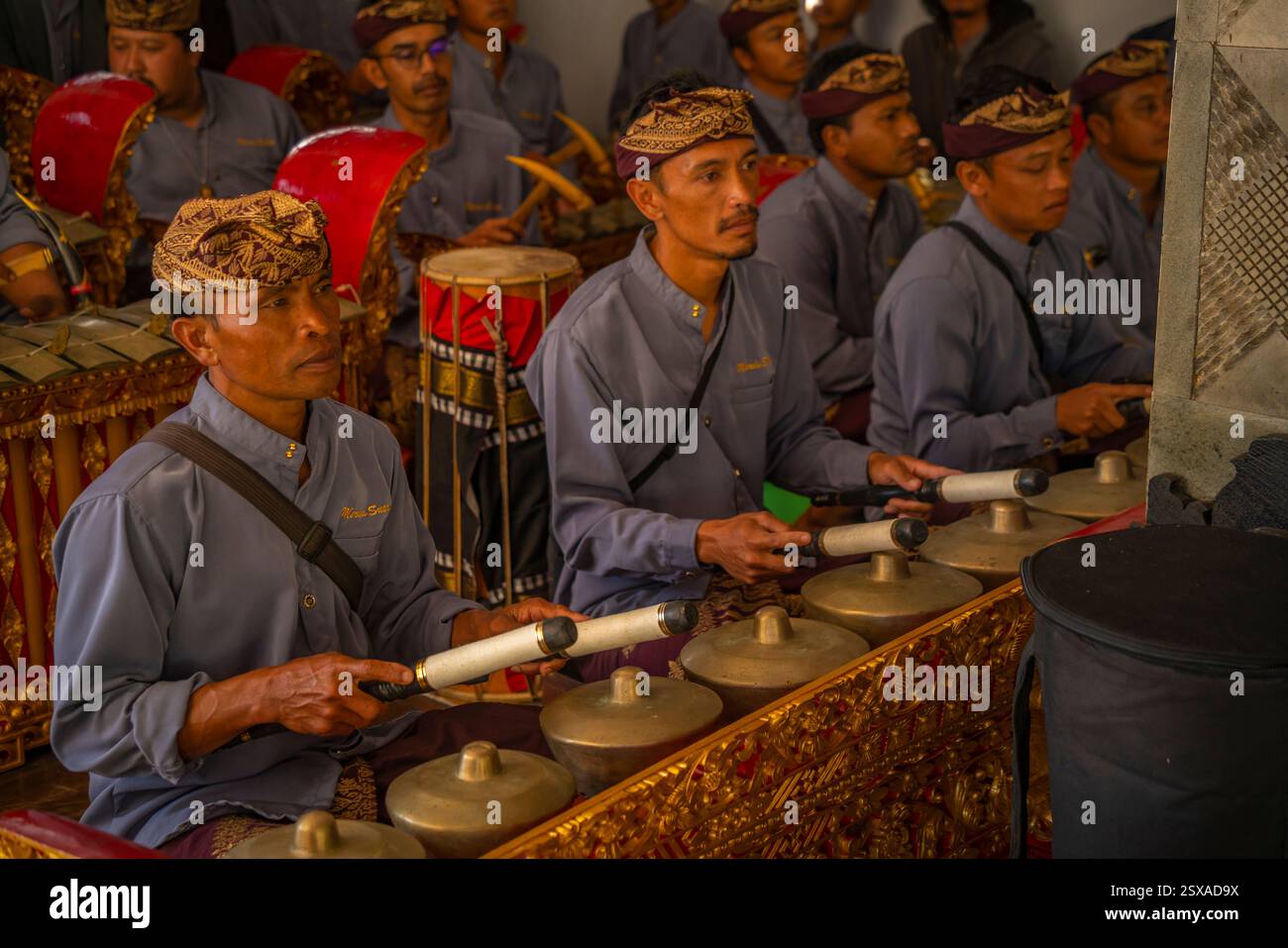 View of locals playing Gamelan Saron Gangsa, traditional musical ...