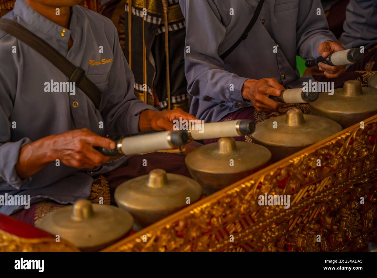 View of locals playing Gamelan Saron Gangsa, traditional musical ...