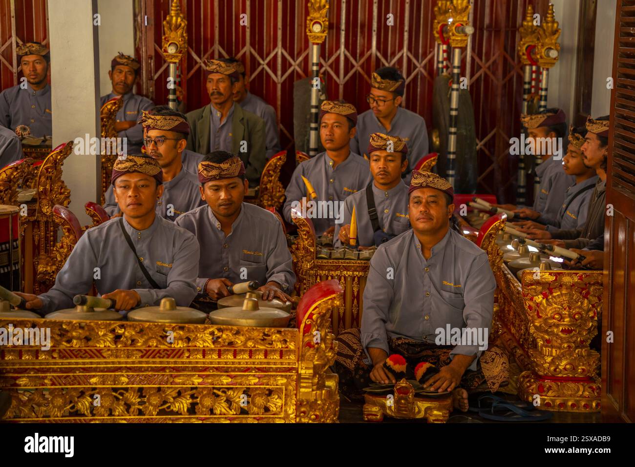 View of locals playing Gamelan Saron Gangsa, traditional musical ...