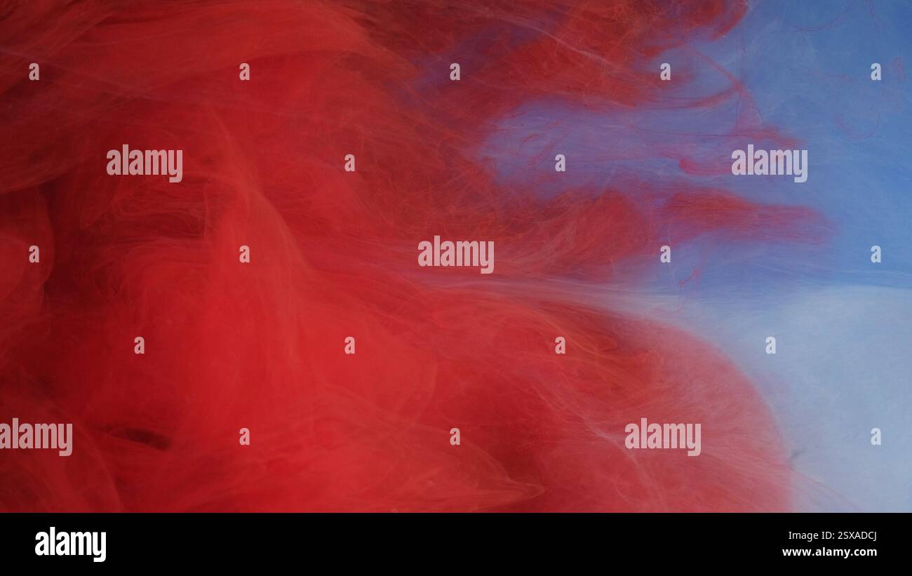 Color splash. Magic smoke. Defocused red glowing vapor paint ink ...