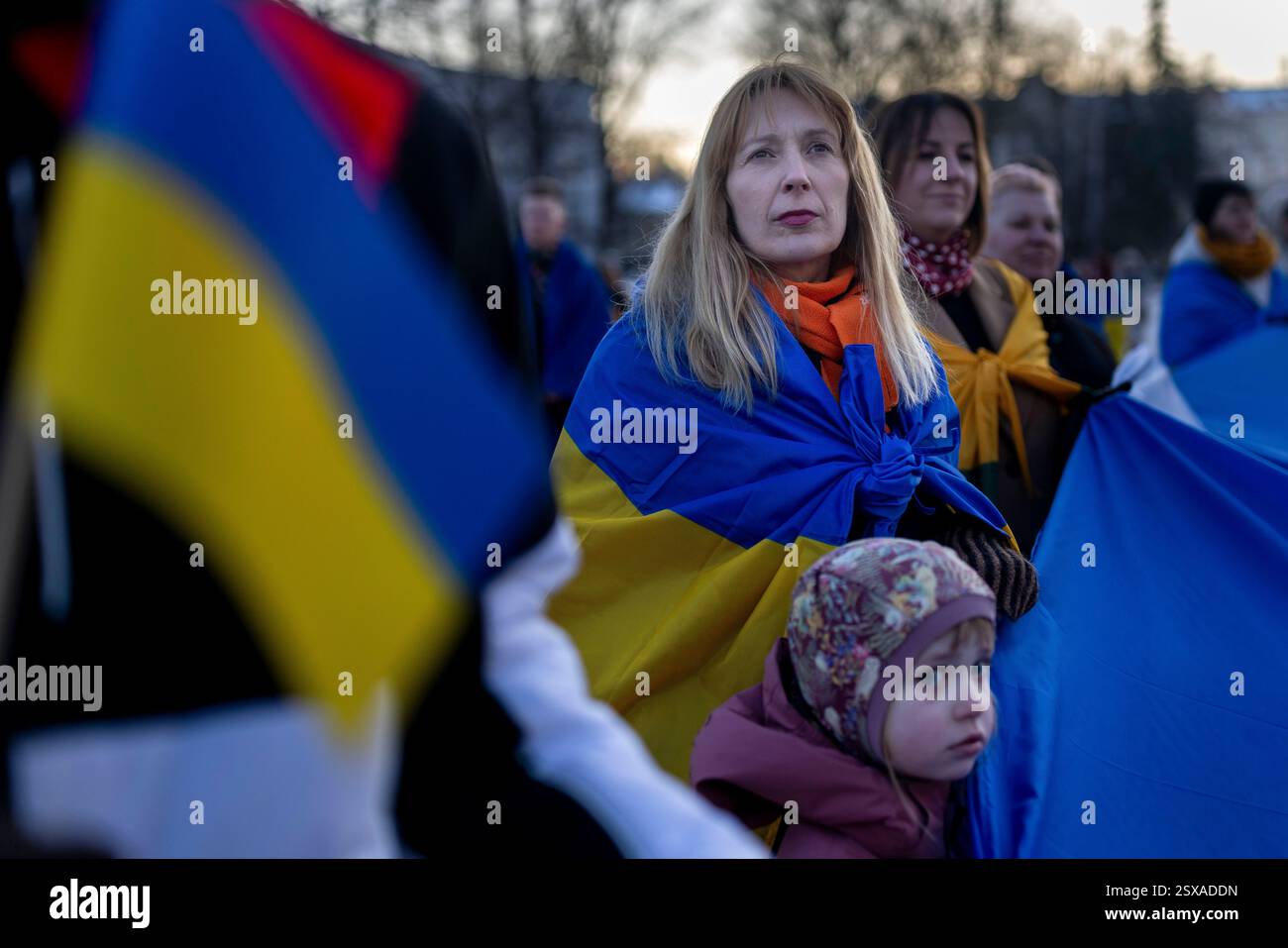 People attend a demonstration against Russia's war on Ukraine to mark ...
