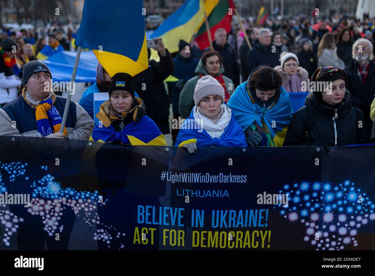 People attend a demonstration against Russia's war on Ukraine to mark ...