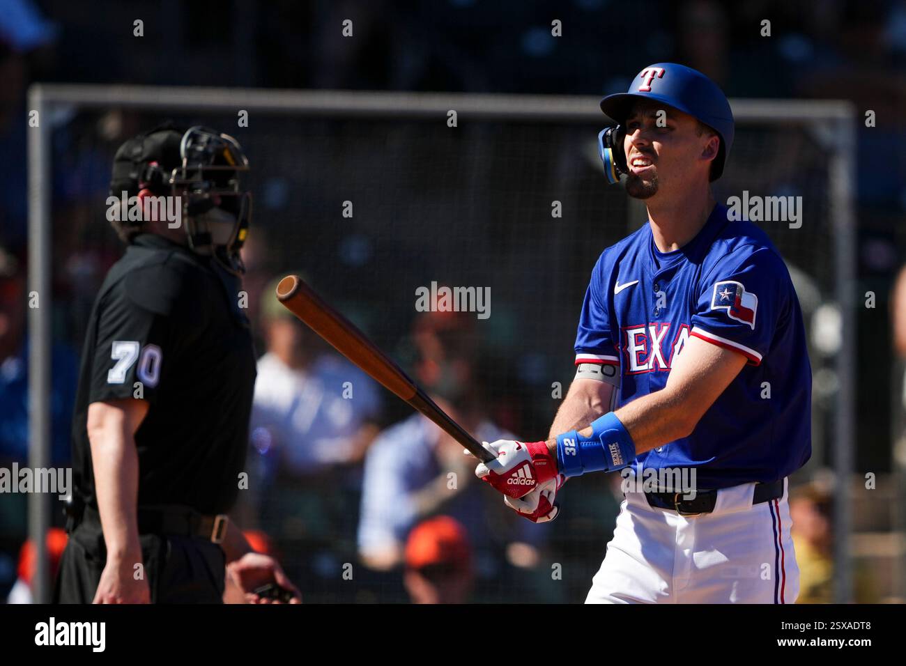 Texas Rangers' Evan Carter walks to the dugout after an out against the ...