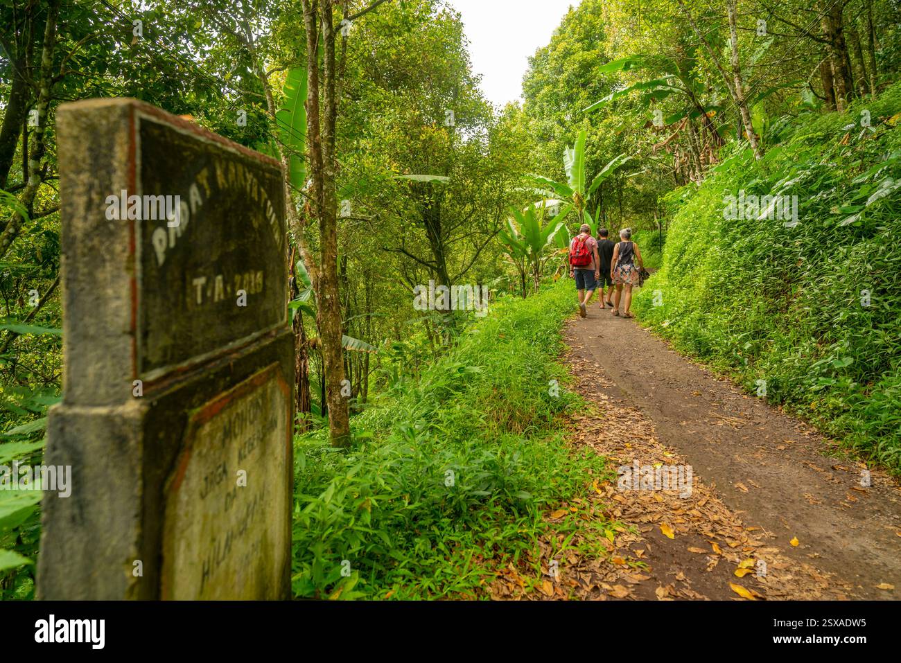 View of visitors walking to Melanting waterfall, Kabupaten Buleleng ...