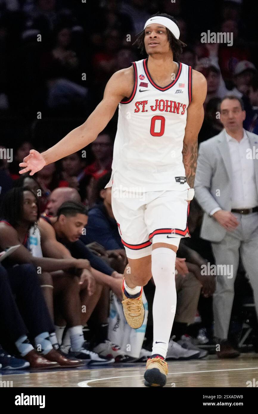 St. John's Aaron Scott reacts after hitting a three-point basket during ...