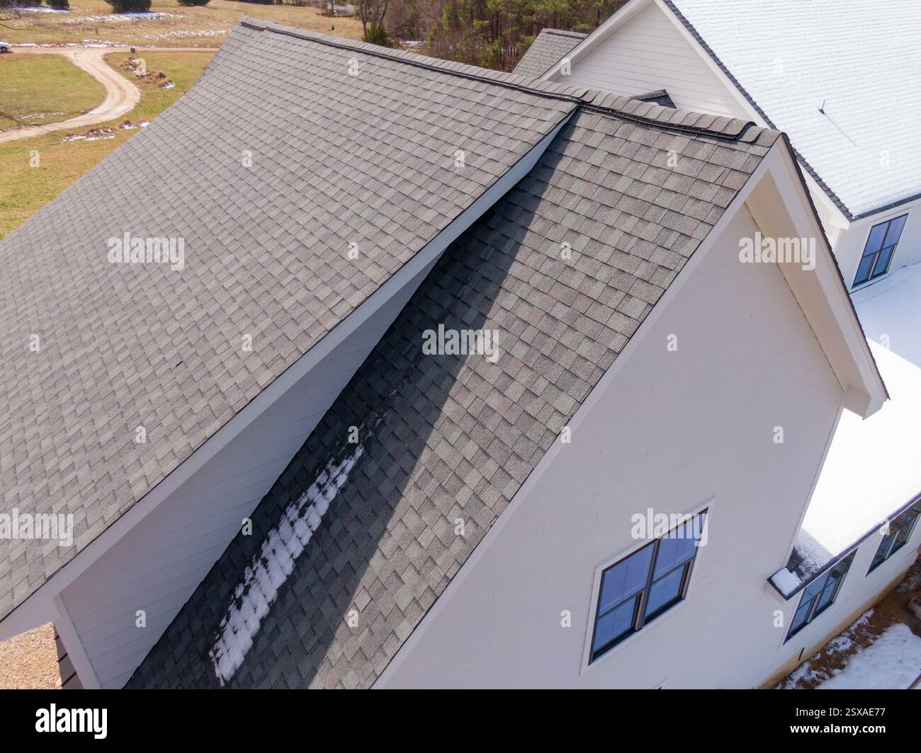 Sunny Daytime Drone Images of a New Custom Home Under Construction and ...