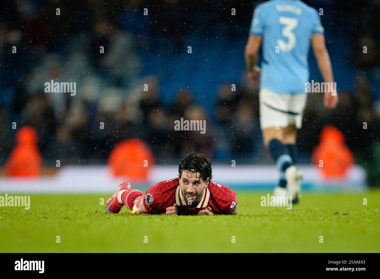 Liverpool's Dominik Szoboszlai, bottom, reacts at the end of the ...