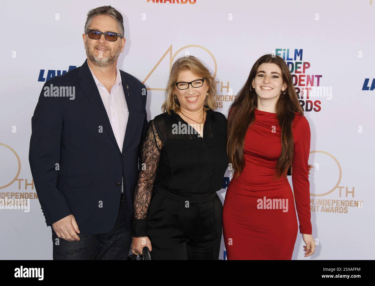 SANTA MONICA, CALIFORNIA - FEBRUARY 22: (L-R) Frank Evers, Lauren Greenfield and Sydney Shear ...