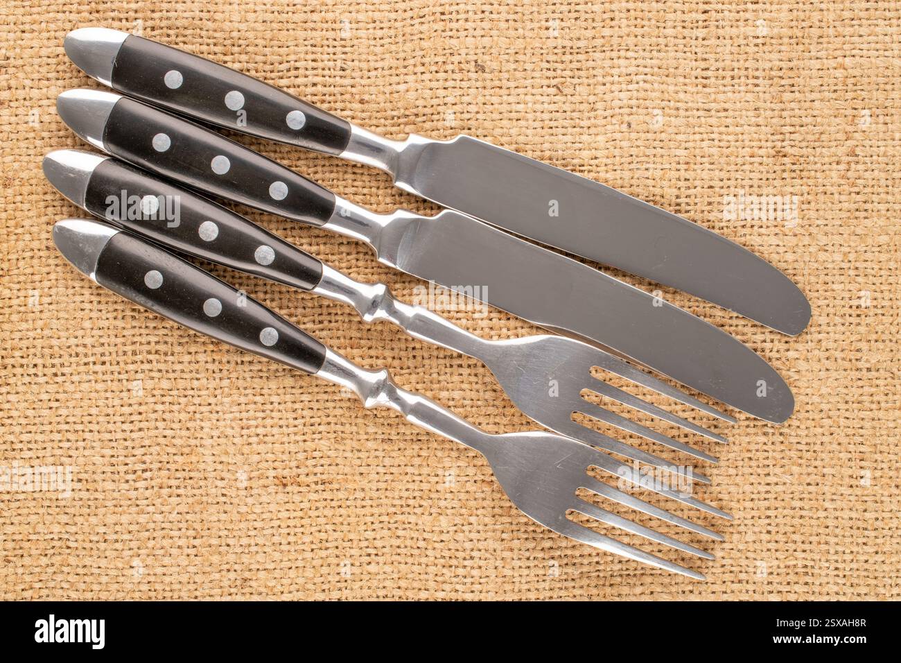 Cutlery on jute cloth hi-res stock photography and images - Alamy