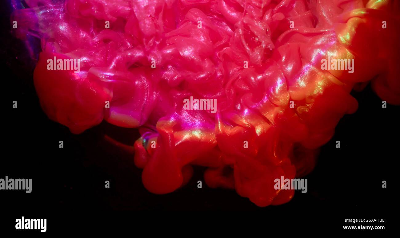 Glitter flow paint explosion glossy hi-res stock photography and images ...