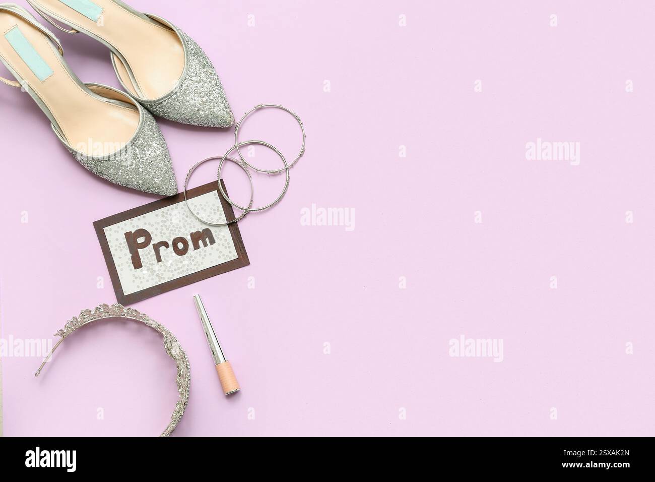 Word PROM with female shoes, bracelets and tiara on lilac background ...