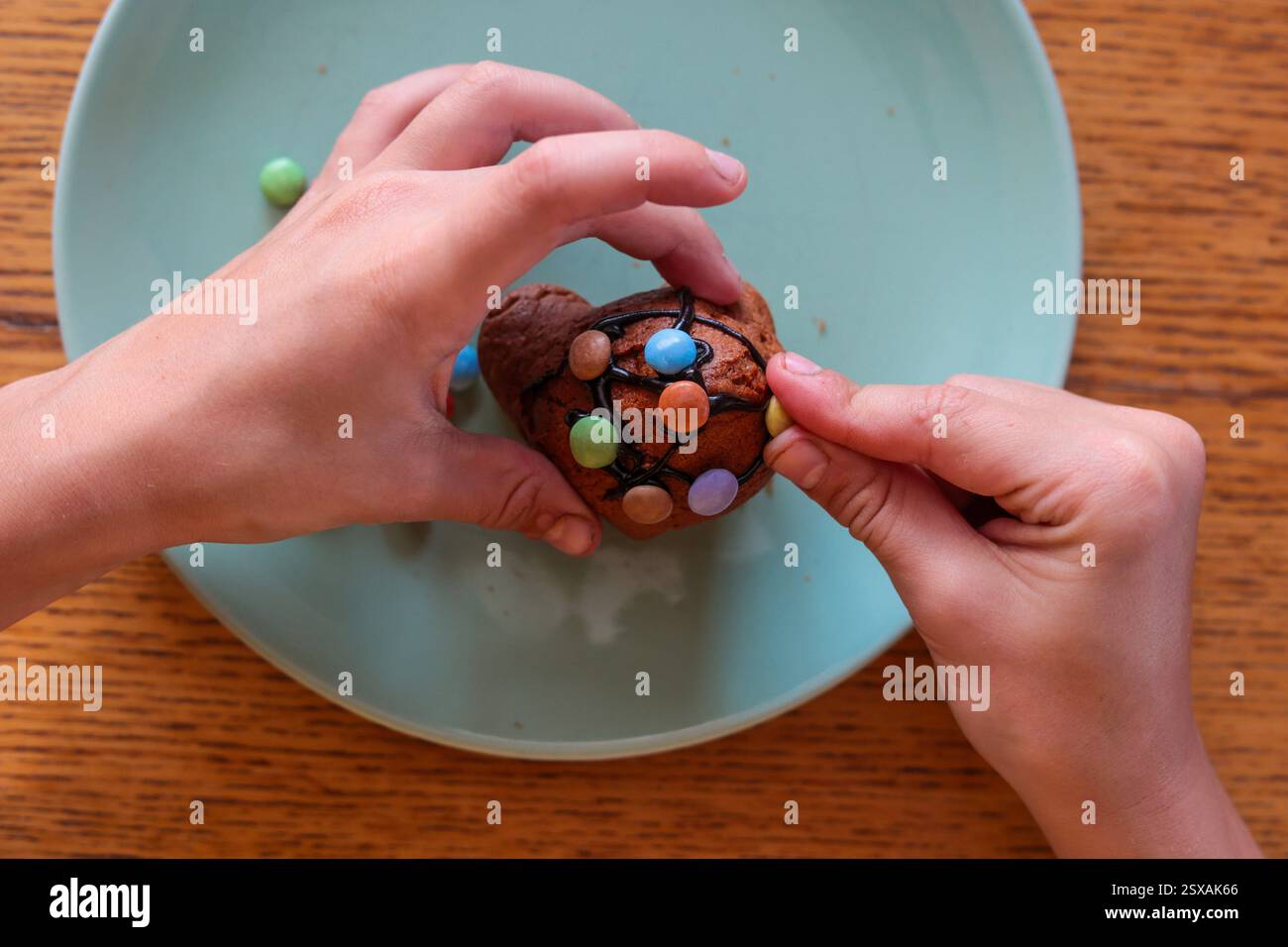 Easter cupcake decorated with children's hands by gluing candies onto ...