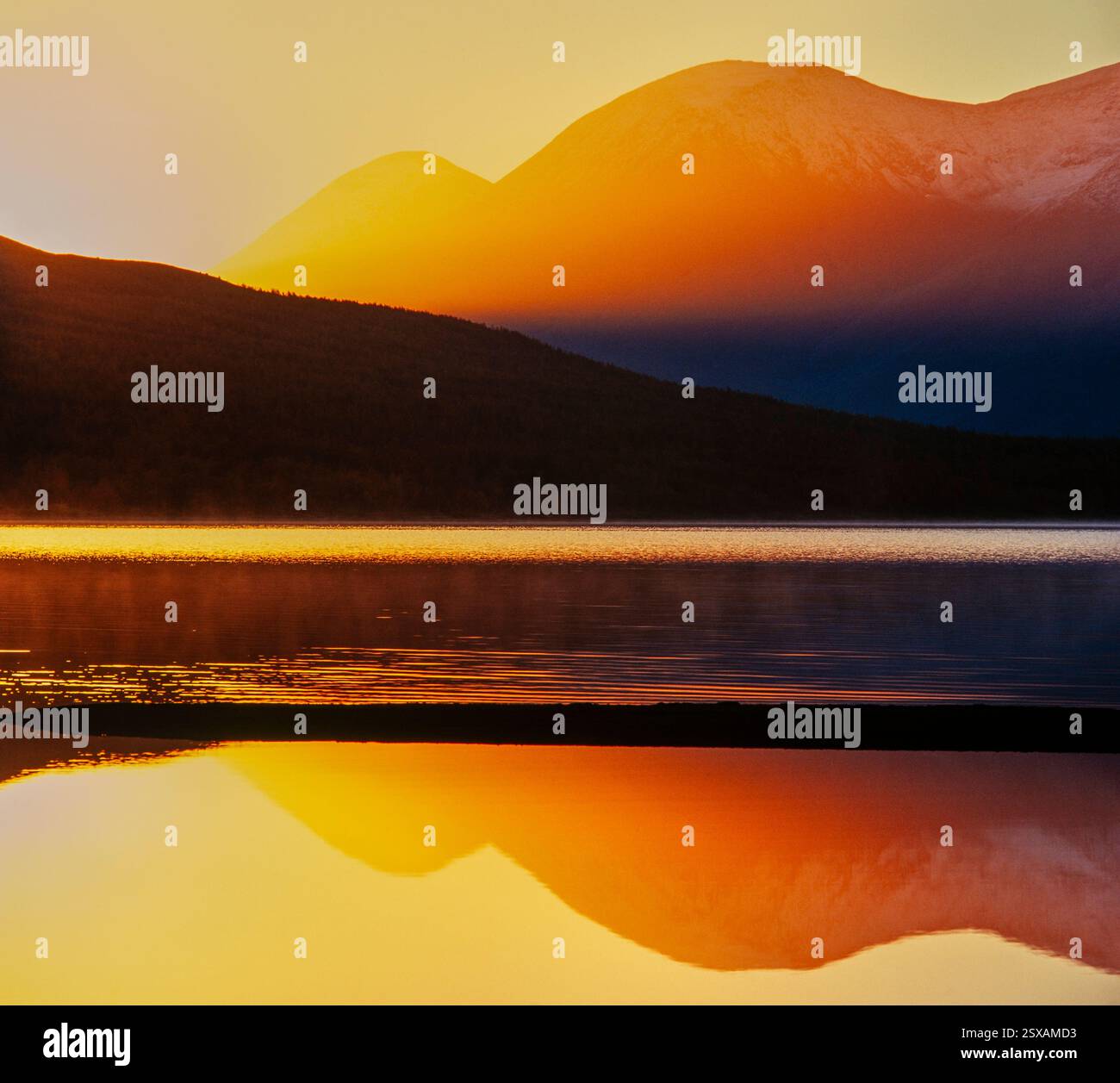 Lake at dawn Stock Photo - Alamy