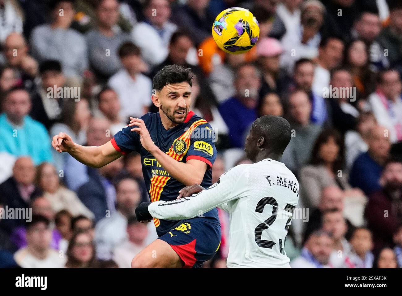 Ferland Mendy of Real Madrid CF and Ivan Martin of Girona FC during ...