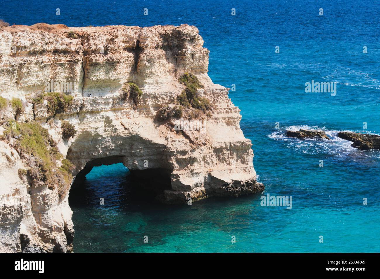 Wonderful sea with cliffs and rocky arch. Torre Sant'Andrea, Salento ...