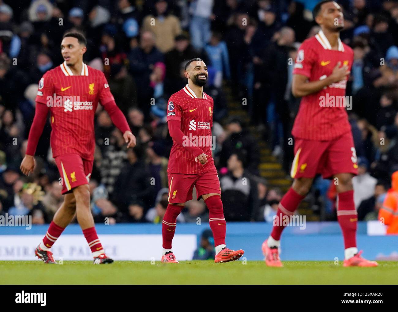 Manchester, UK. 23rd Feb, 2025. A smiling Mohamed Salah of Liverpool ...