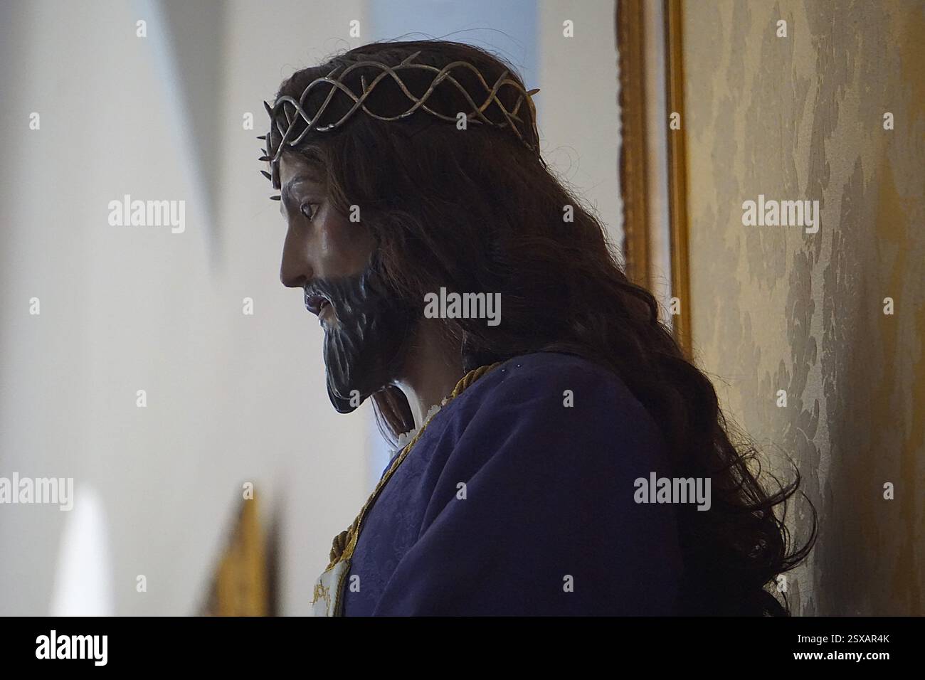 Close up portrait of a statue of merciful Lord and Savior Jesus bowing ...