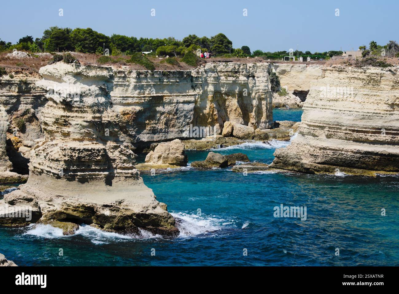 Wonderful seascape with cliffs and sea stacks (faraglioni), at Torre ...