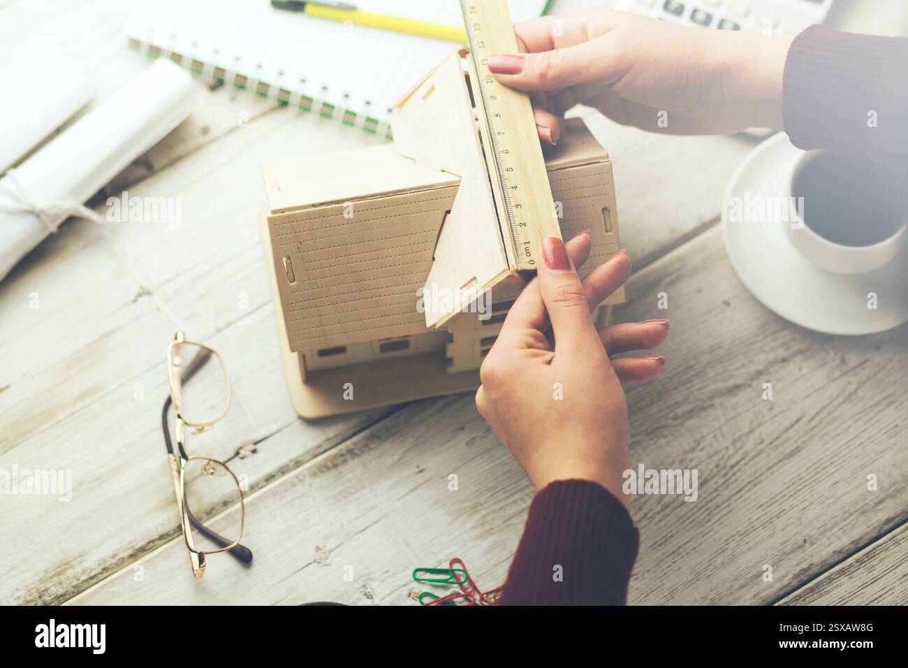 Woman ruler pencil measuring hi-res stock photography and images - Alamy