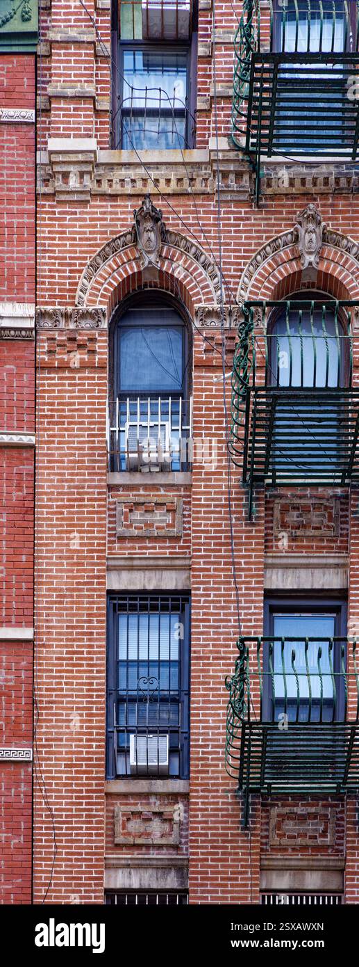 Terra cotta details at 88 Elizabeth Street, a seven-story brick and ...