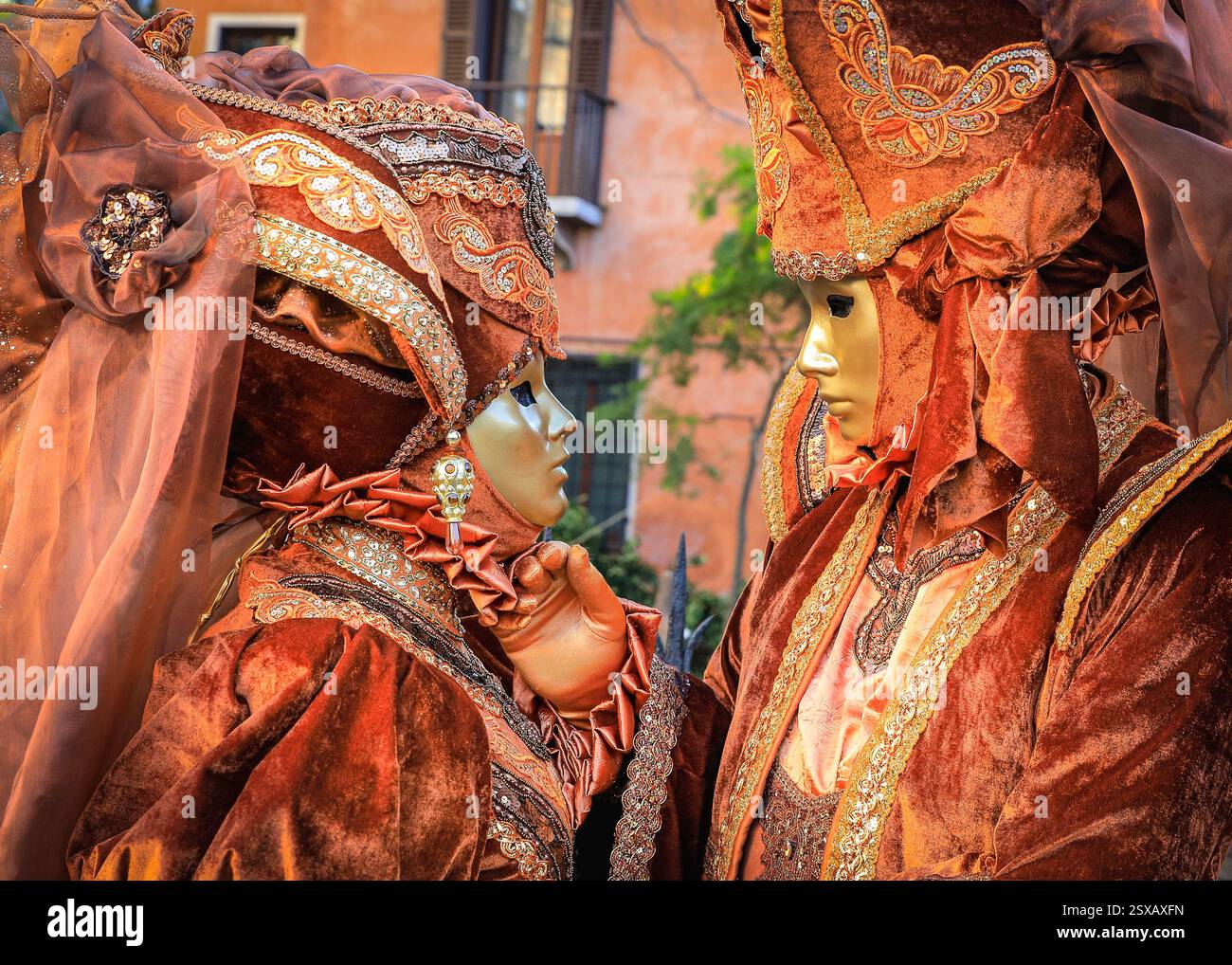 Venice carnival, costumed participants in historic Venetian costume ...