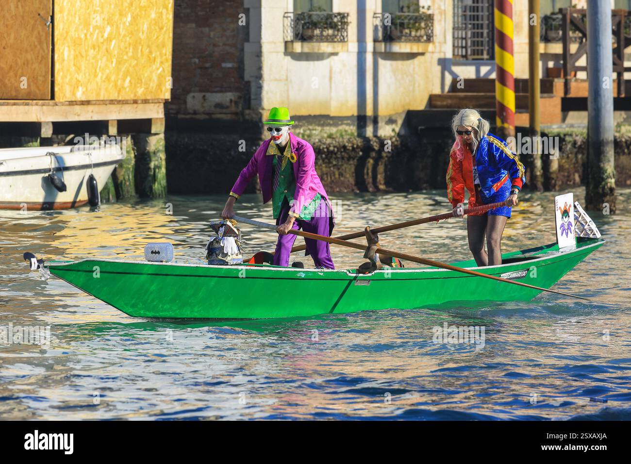 People in costume in a gondola on the Grand Canal during the carnival ...
