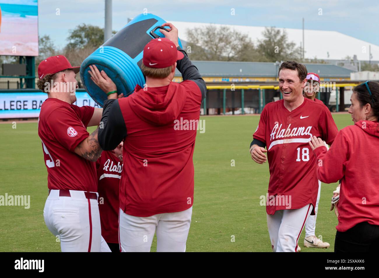 Alabama Crimson Tide Will Hodo (18) is doused with water after hitting ...