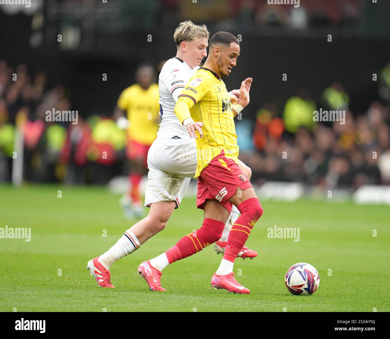 Alfie Doughty of Luton Town tries to win the ball off Thomas Ince of ...