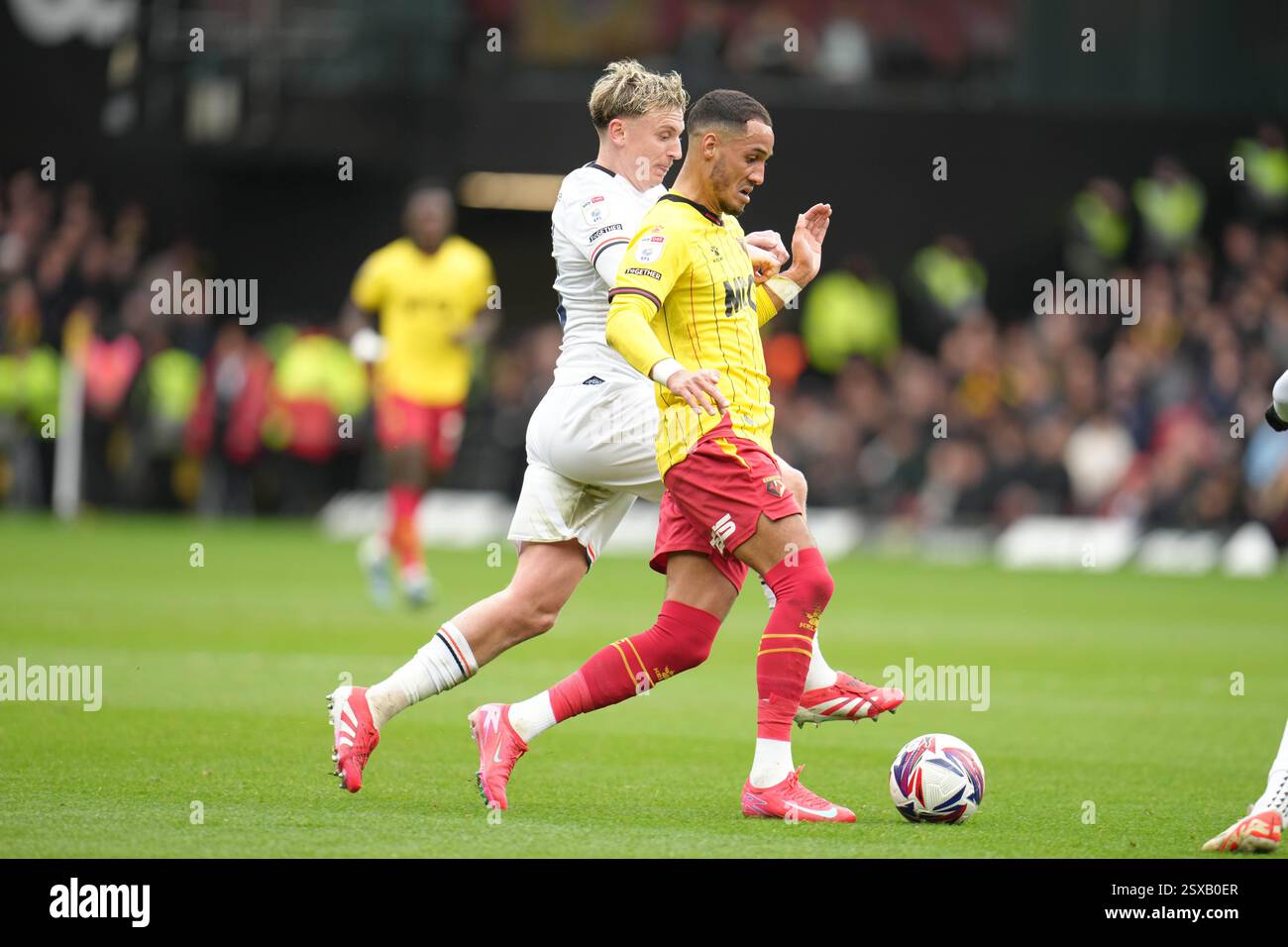 Alfie Doughty of Luton Town attempts to win the ball off Thomas Ince of ...