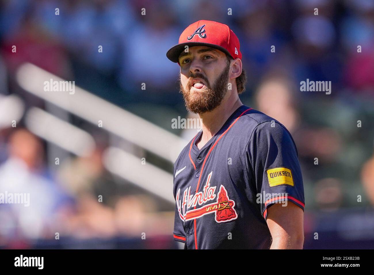 Atlanta Braves pitcher Ian Anderson walks to the dugout after being ...