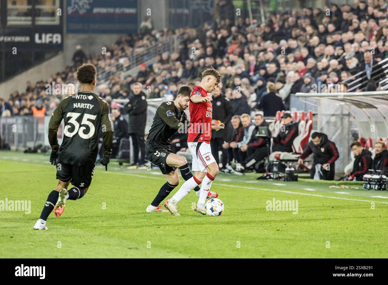 Vejle, Denmark. 23rd Feb, 2025. Tobias Lauritsen (8) of Vejle BK and ...