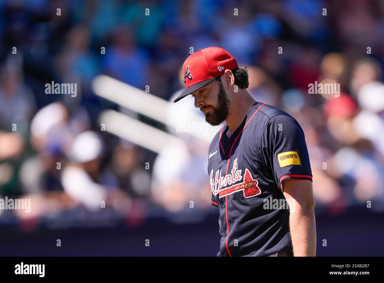 Atlanta Braves pitcher Ian Anderson walks to the dugout after being ...