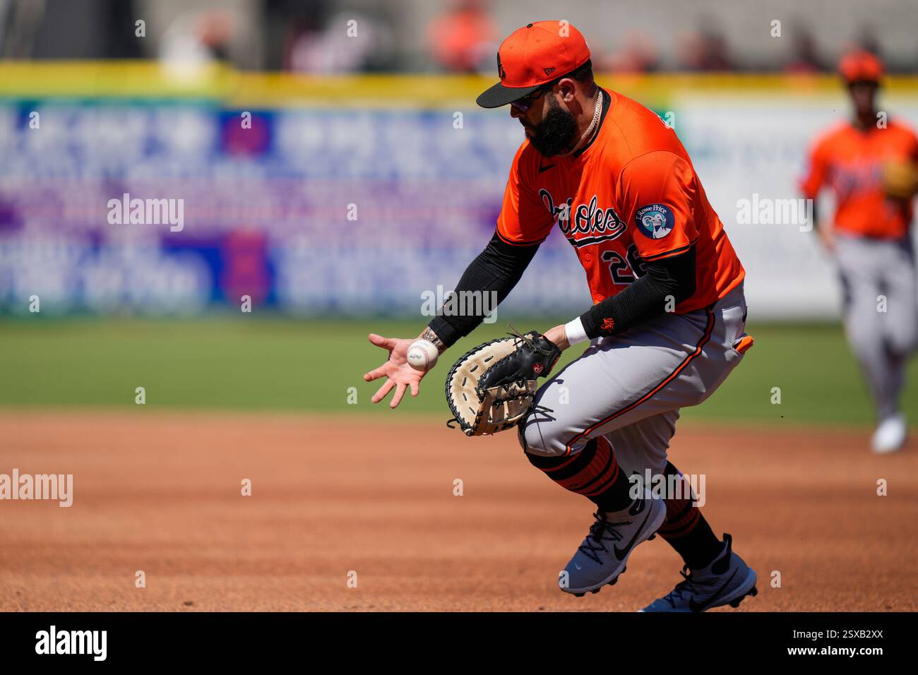 Baltimore Orioles first baseman Emmanuel Rivera bobbles a ground ball ...
