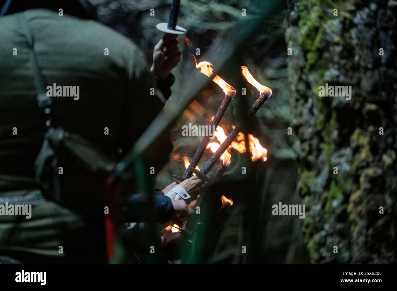 Pforzheim, Germany. 23rd Feb, 2025. Participants in a torchlight vigil ...