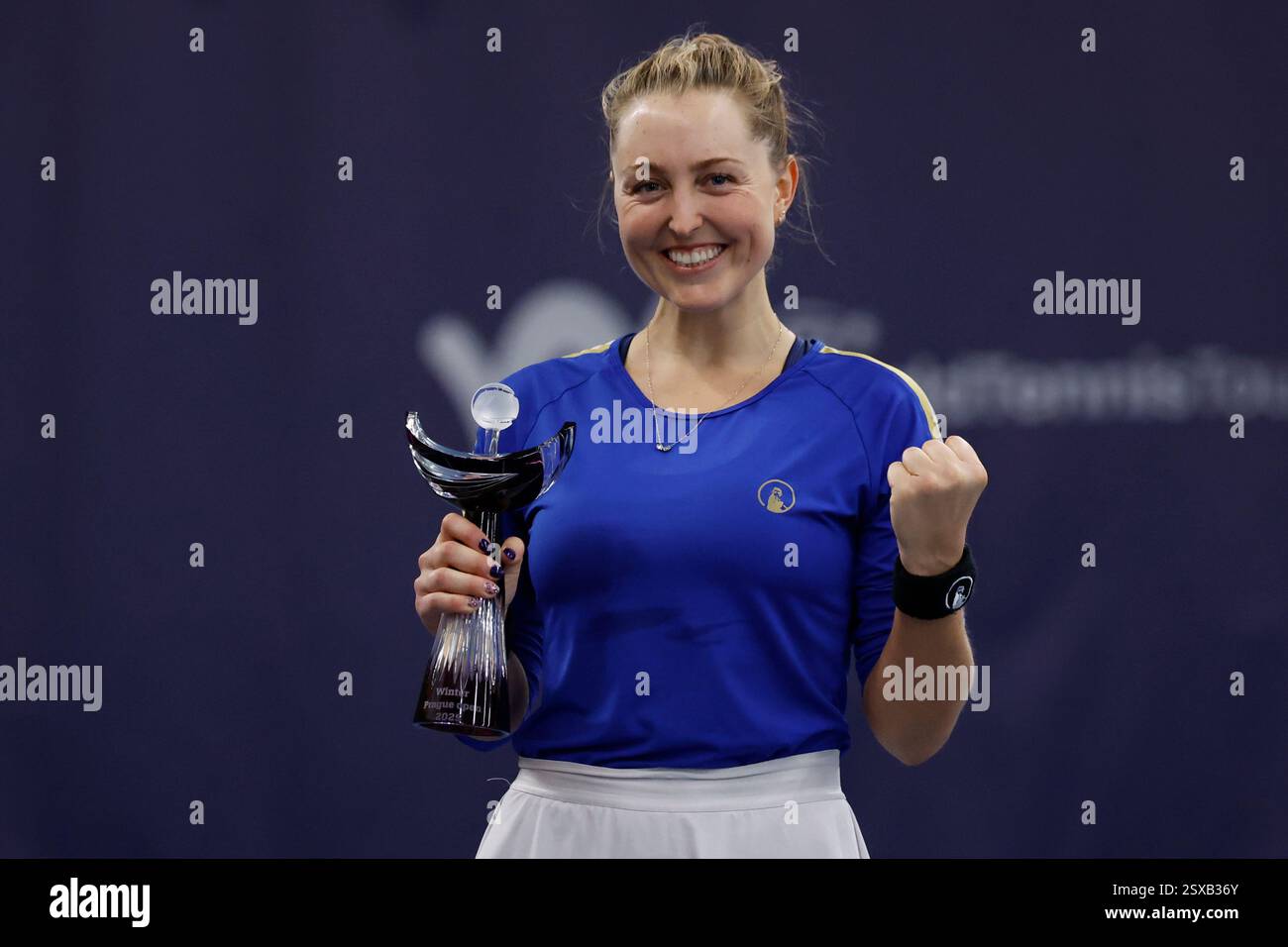 Winner Gabriela Knutson of Czech Republic poses with trophy at the ITF ...