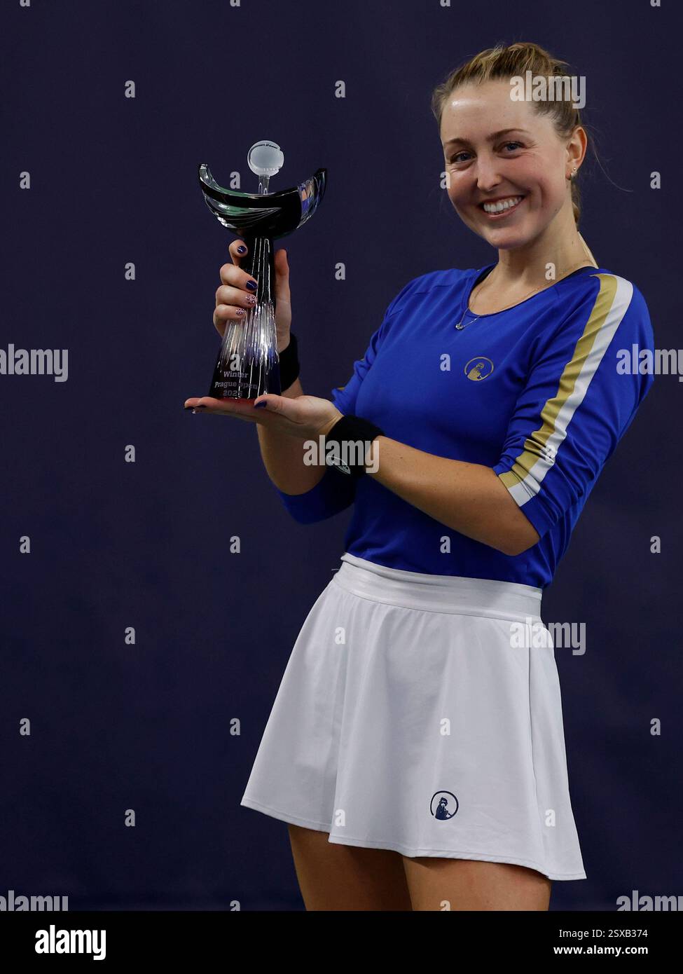 Winner Gabriela Knutson of Czech Republic poses with trophy at the ITF ...