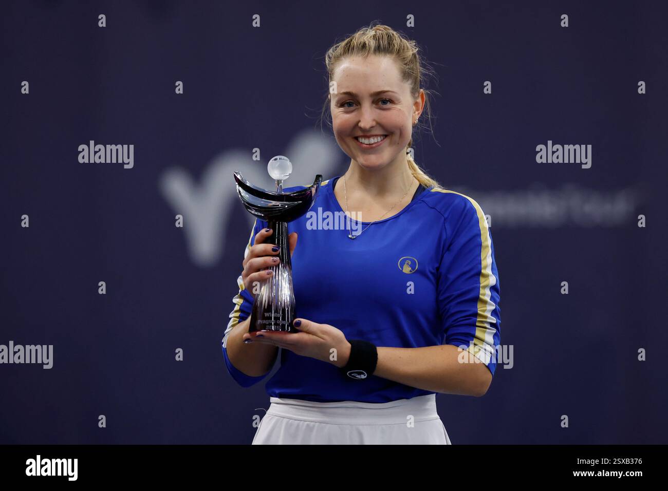 Winner Gabriela Knutson of Czech Republic poses with trophy at the ITF ...