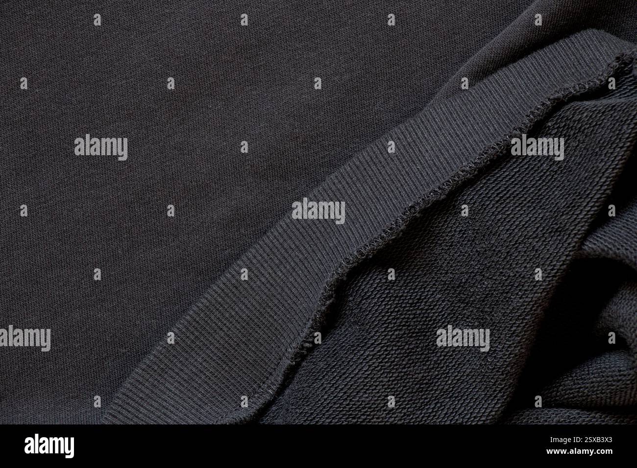 Plain black cotton fabric as background close-up, black clothes Stock ...