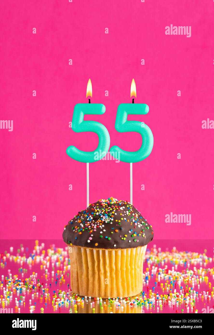 Birthday cupcake with number 55 candle - Celebration card on fuchsia ...