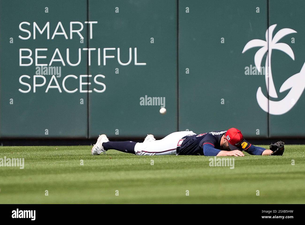 Atlanta Braves Kevin Kilpatrick dives in vain for an RBI double by ...