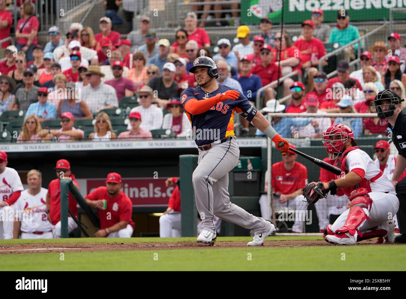 Houston Astros' Yainer Diaz singles during the first inning of a spring ...