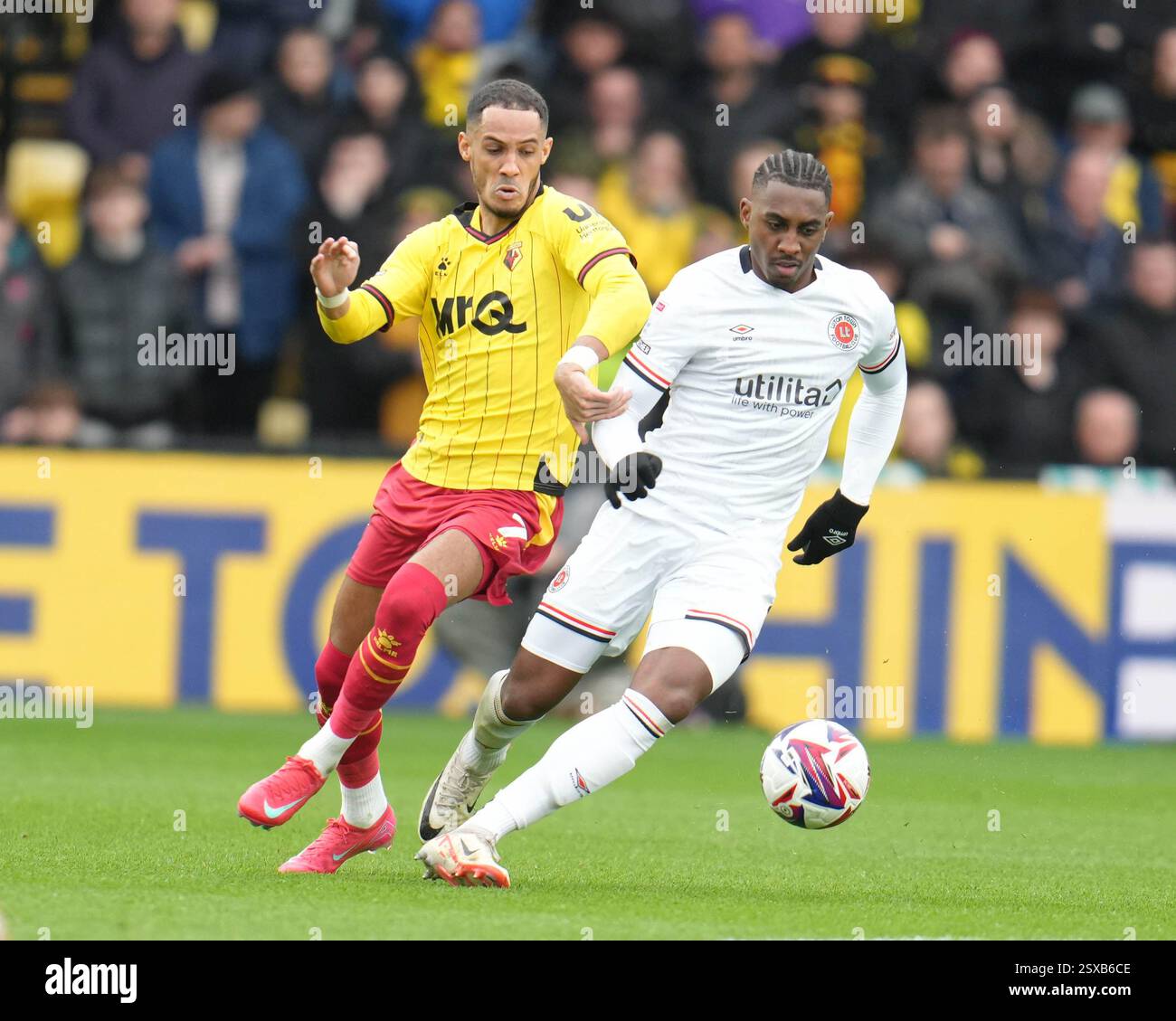 Amari'i Bell of Luton Town and Thomas Ince of Watford battle for the ...