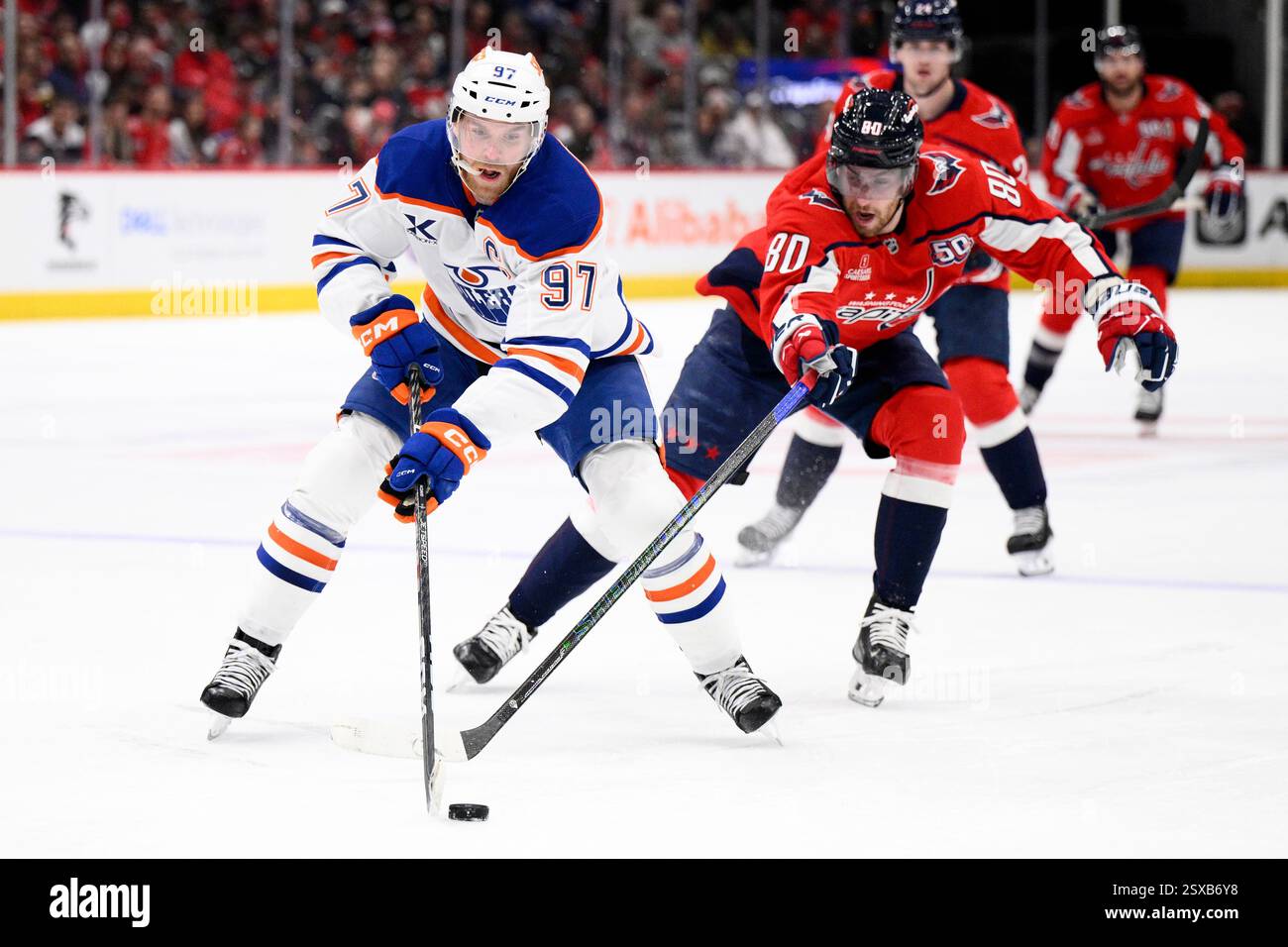 Edmonton Oilers center Connor McDavid (97) skates with the puck past ...