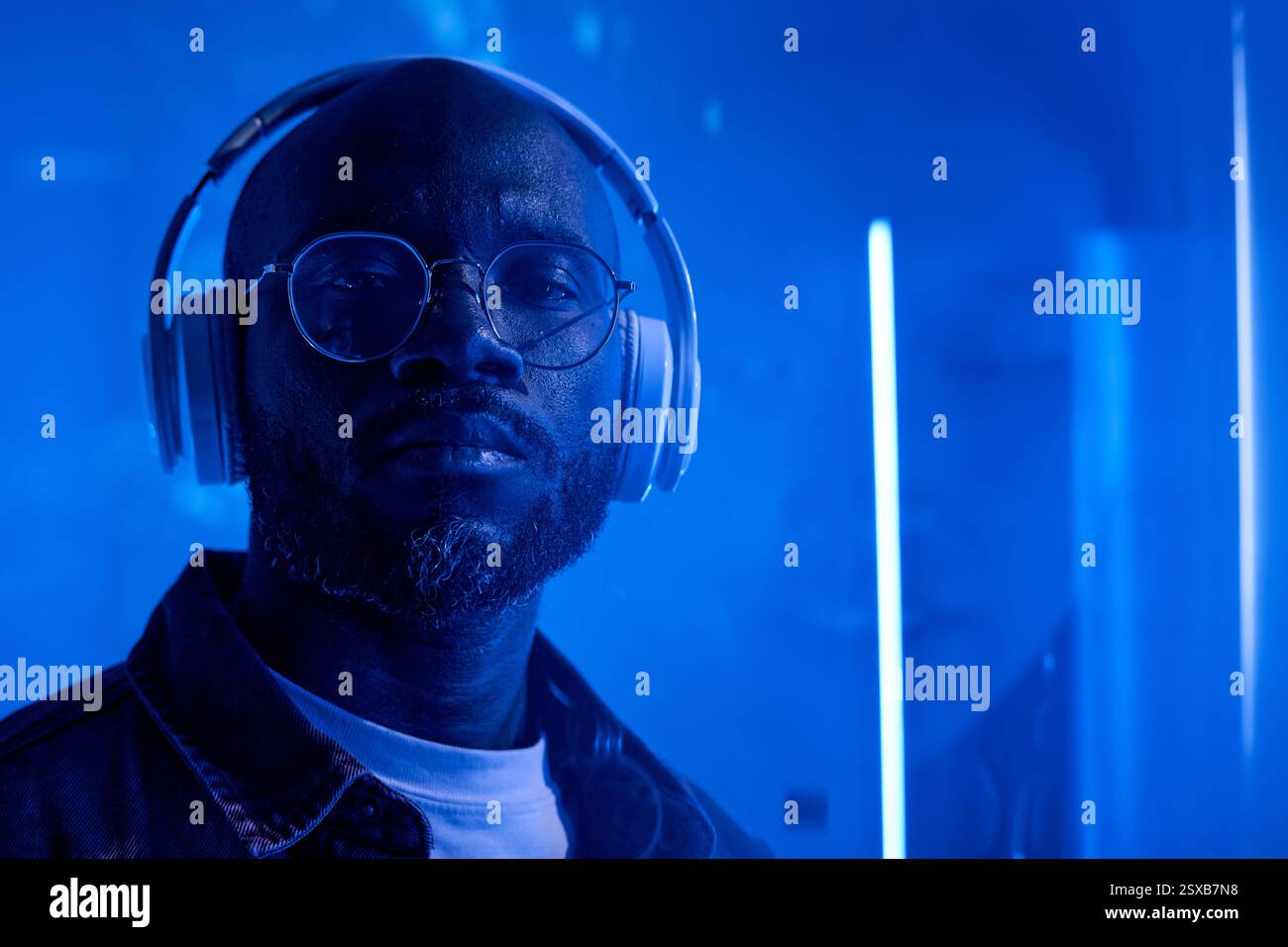 Bald man wearing glasses hi-res stock photography and images - Alamy