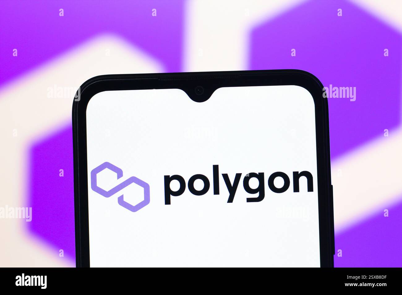 In this photo illustration, the Polygon logo is seen displayed on a ...