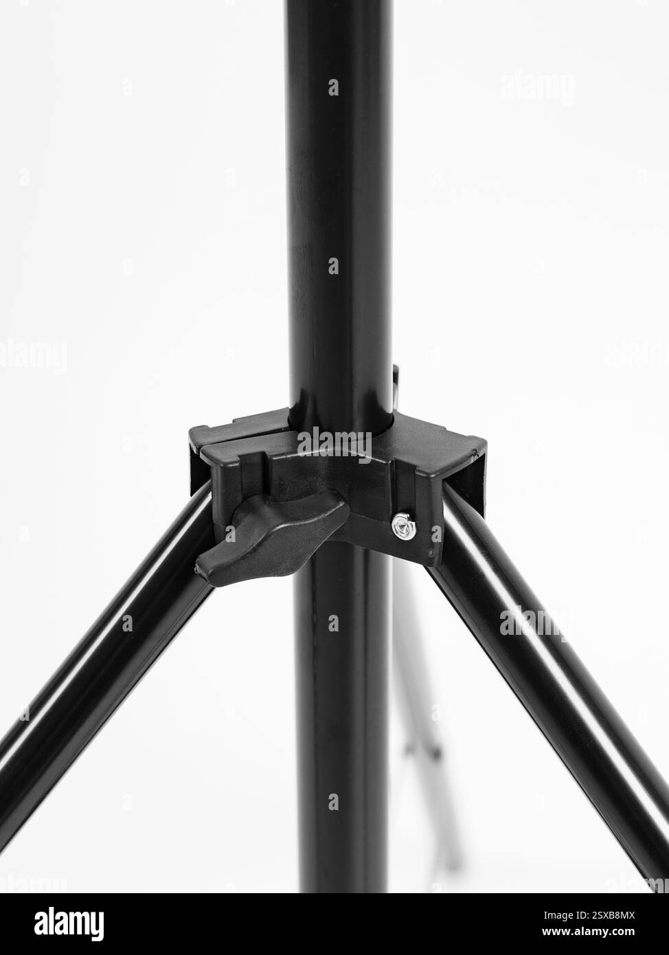 Black Chinese tripod, close-up details. White background Stock Photo ...